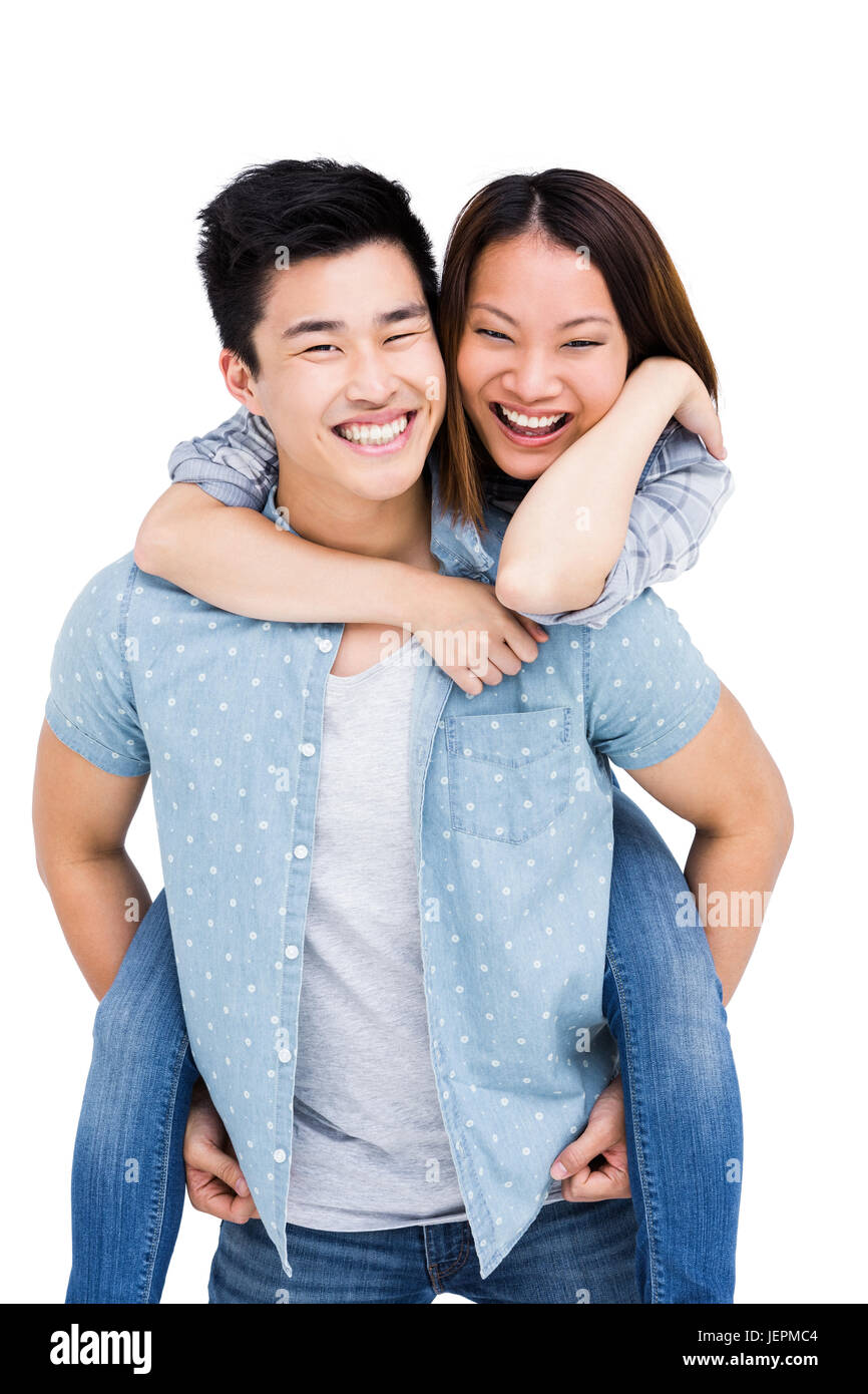 Young woman giving piggyback ride hi-res stock photography and images ...