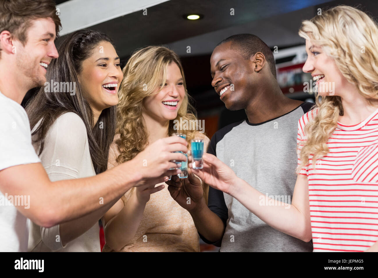 Toasting to shots hi-res stock photography and images - Alamy