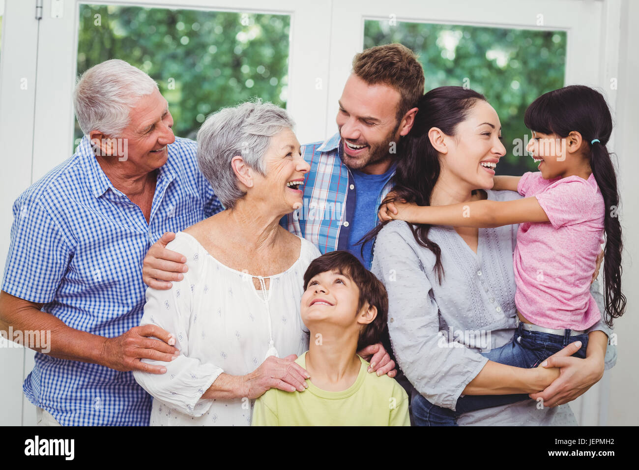 Cheerful multi generation family hi-res stock photography and images ...