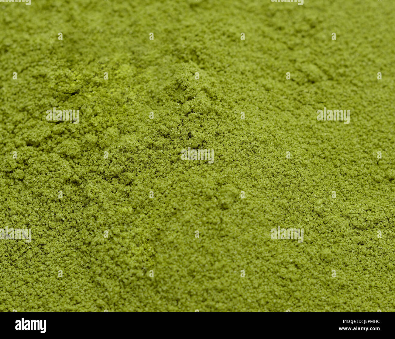 border of powdered green tea top view, Background surface of green ...