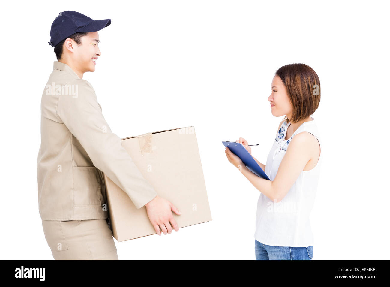 Delivery man with customer Stock Photo - Alamy