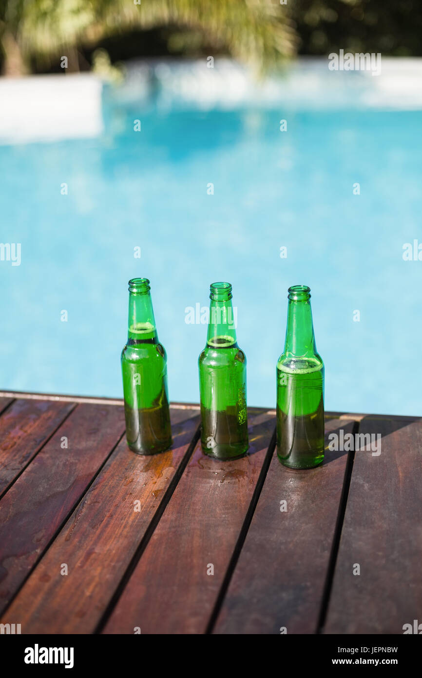 Beer bottles on wooden panel Stock Photo - Alamy