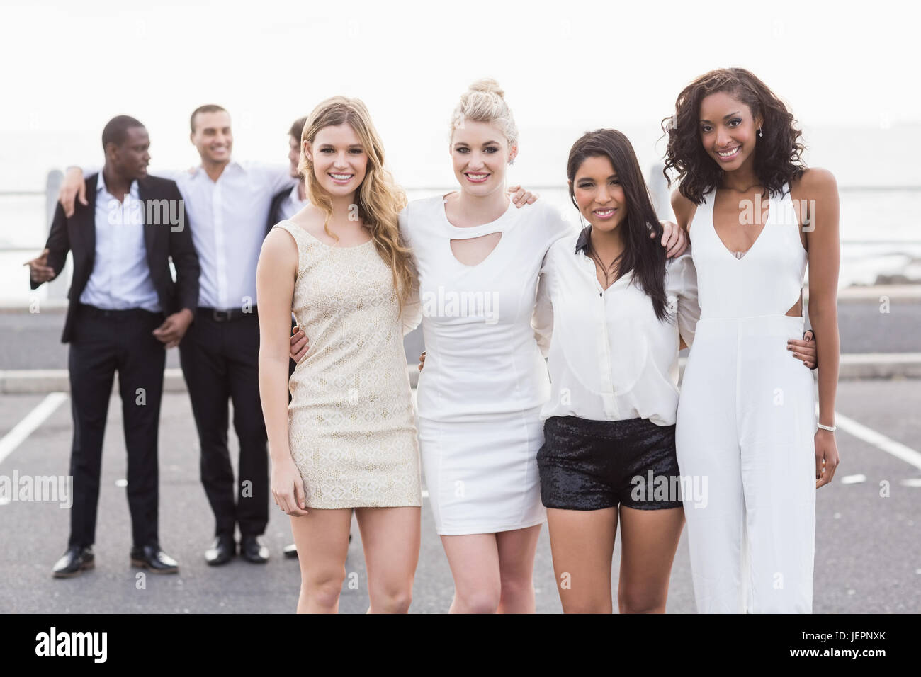 Well dressed people posing Stock Photo - Alamy