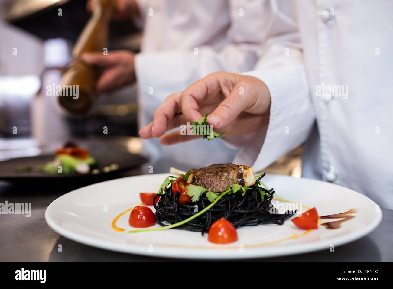 Black garnishing hi-res stock photography and images - Alamy