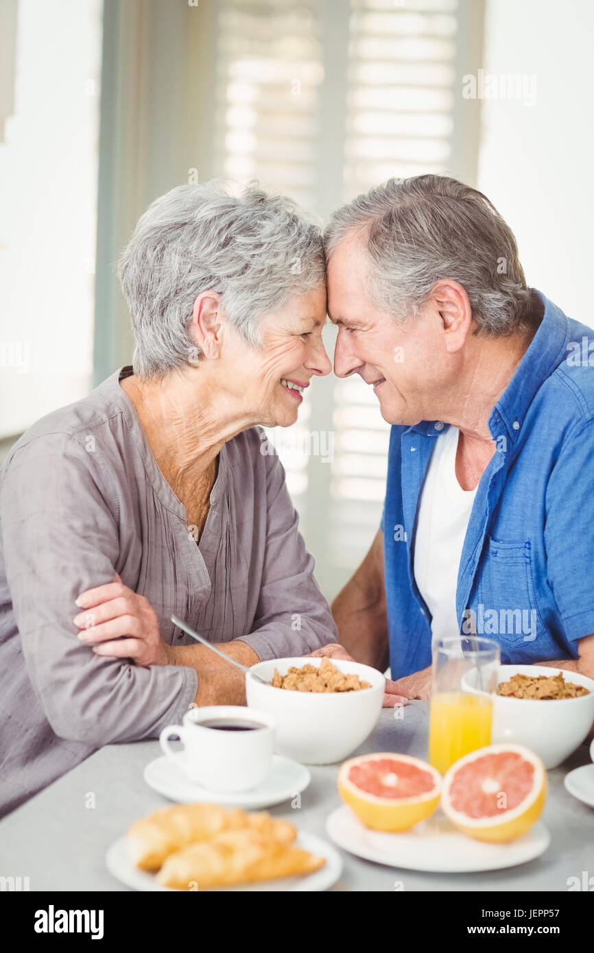 Elderly couple table face each hi-res stock photography and images - Alamy