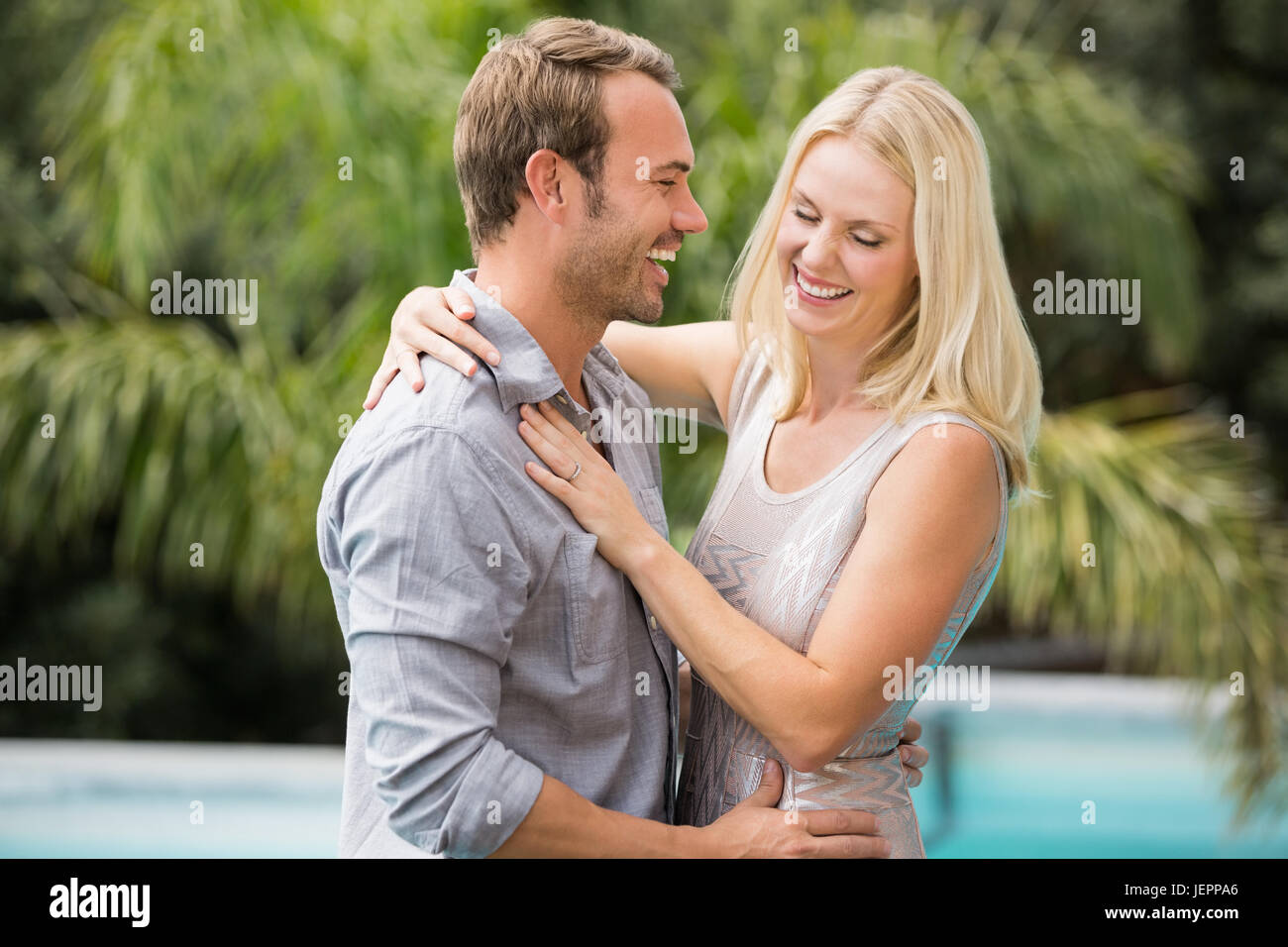 Romantic couple hugging Stock Photo - Alamy