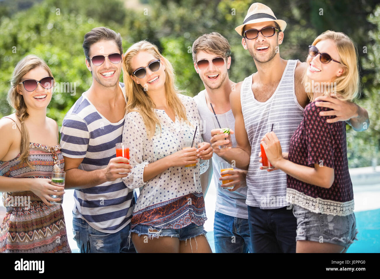 Happy friends interacting having hi-res stock photography and images ...