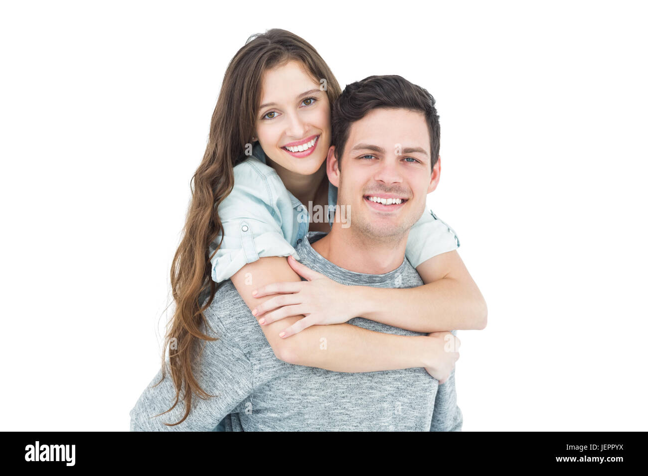 Couple embracing with arms around Stock Photo - Alamy