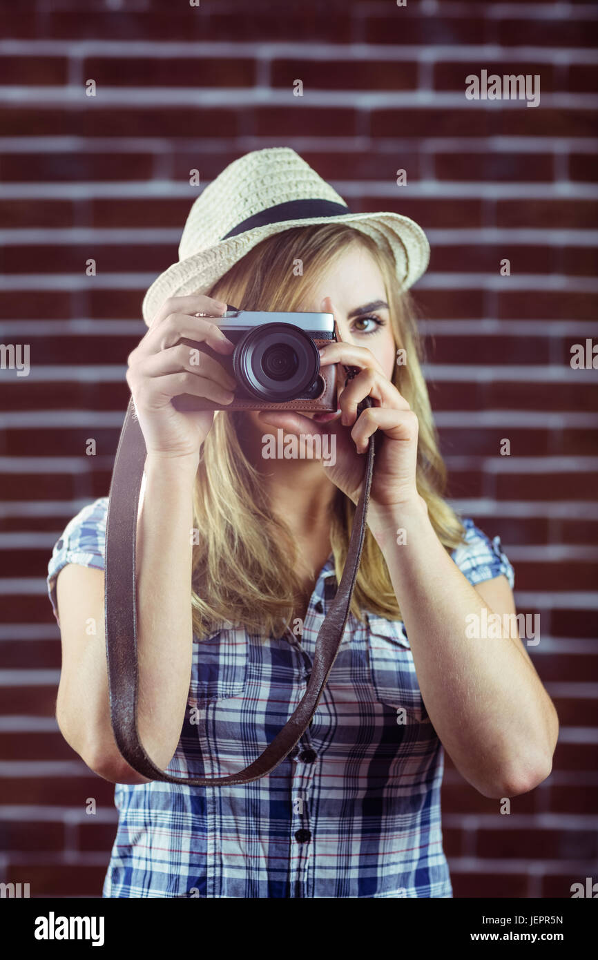 Woman taking pictures Stock Photo - Alamy