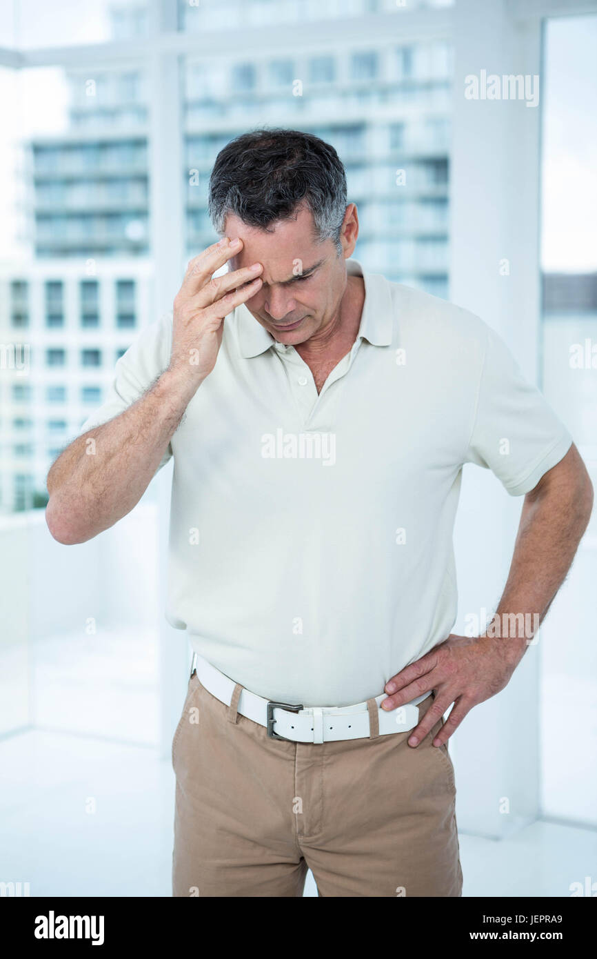 Man worried deeply about something Stock Photo - Alamy