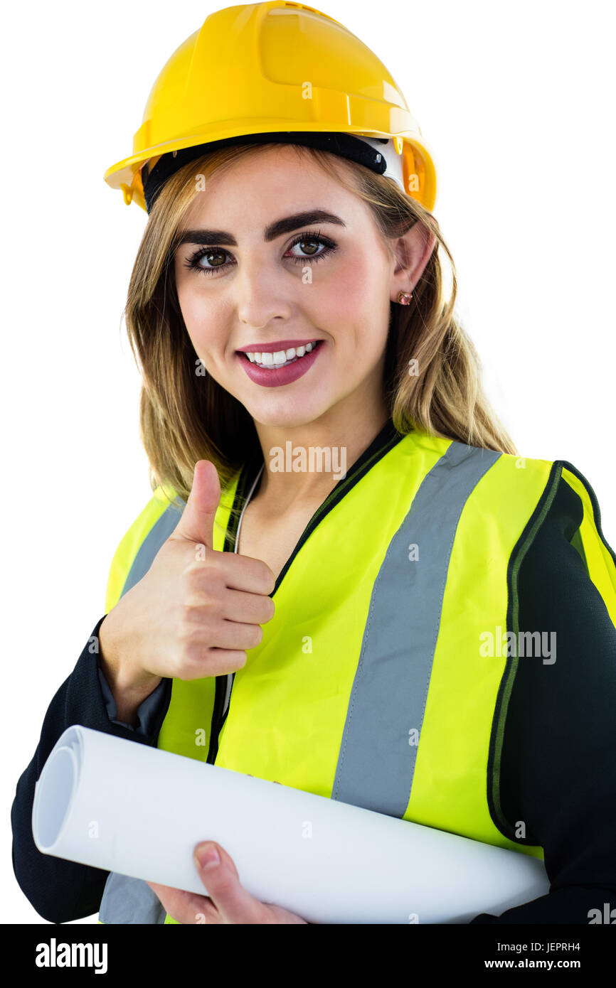 Smiling woman holding construction plan Stock Photo - Alamy