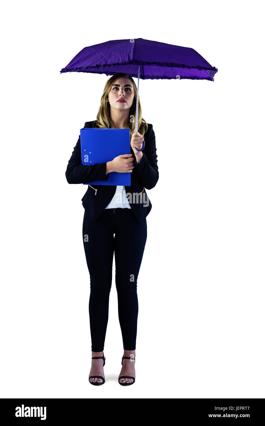 Woman using an umbrella Stock Photo - Alamy