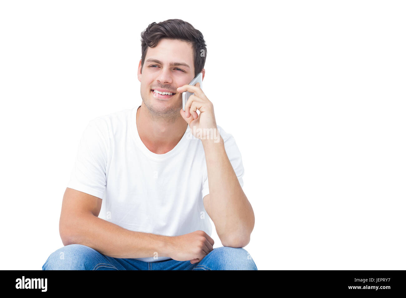 Handsome man having a phone call Stock Photo - Alamy