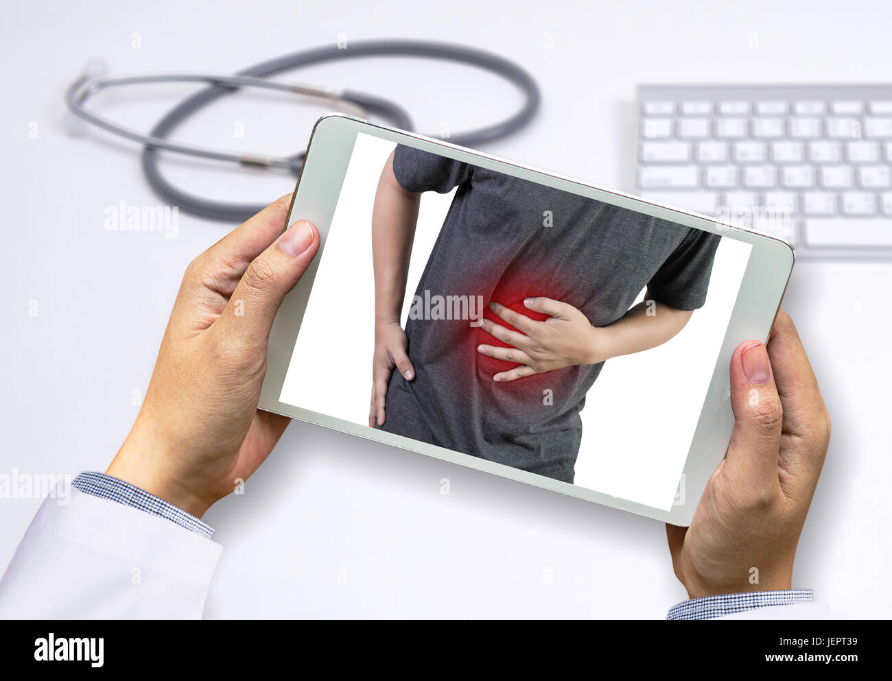 Ache man suffering with back pain backache Pain relief Stock Photo - Alamy