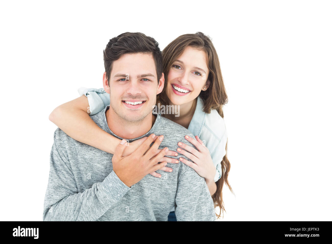 Couple embracing with arms around Stock Photo - Alamy