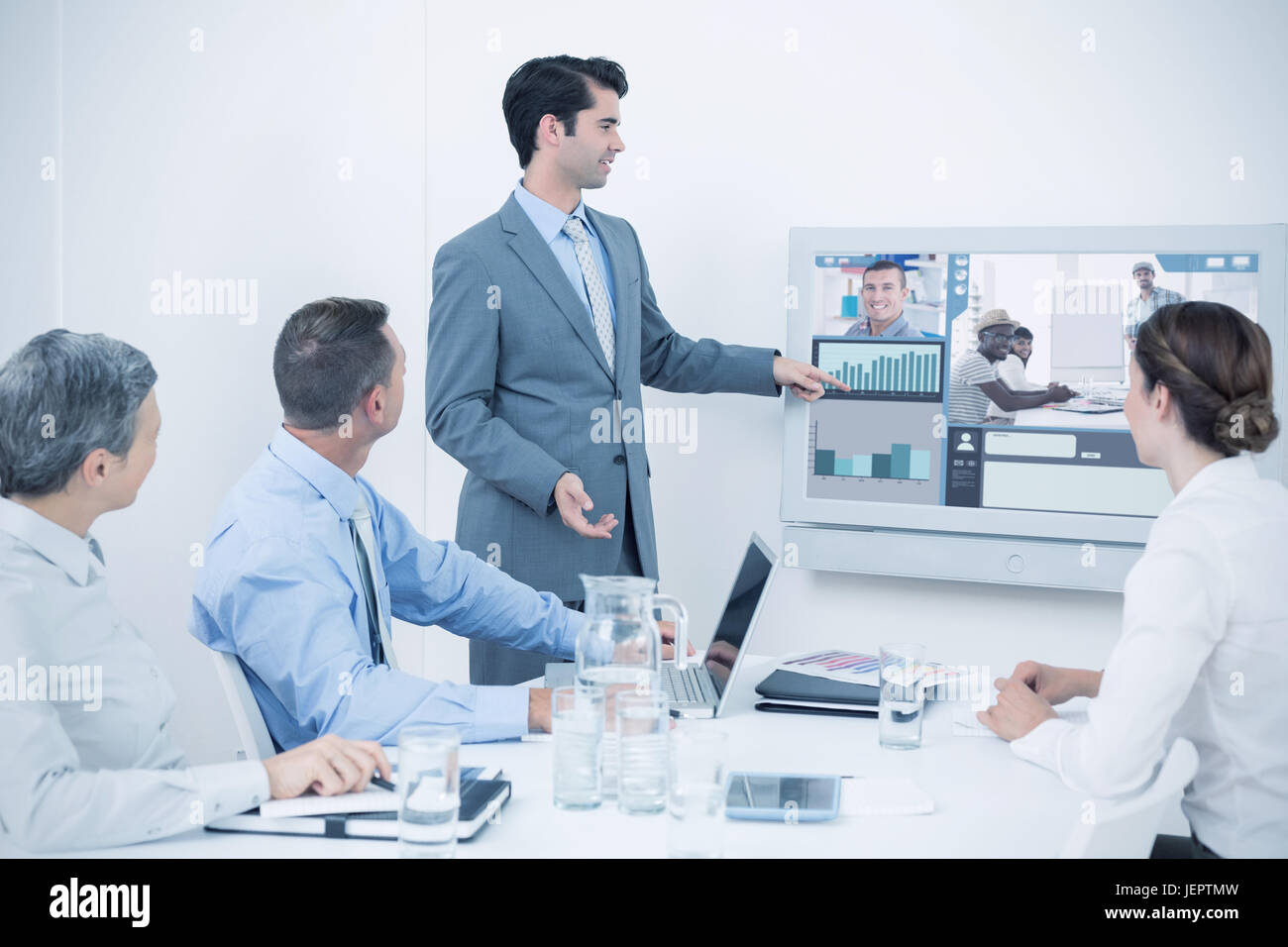 Composite image of screen with graphs Stock Photo - Alamy