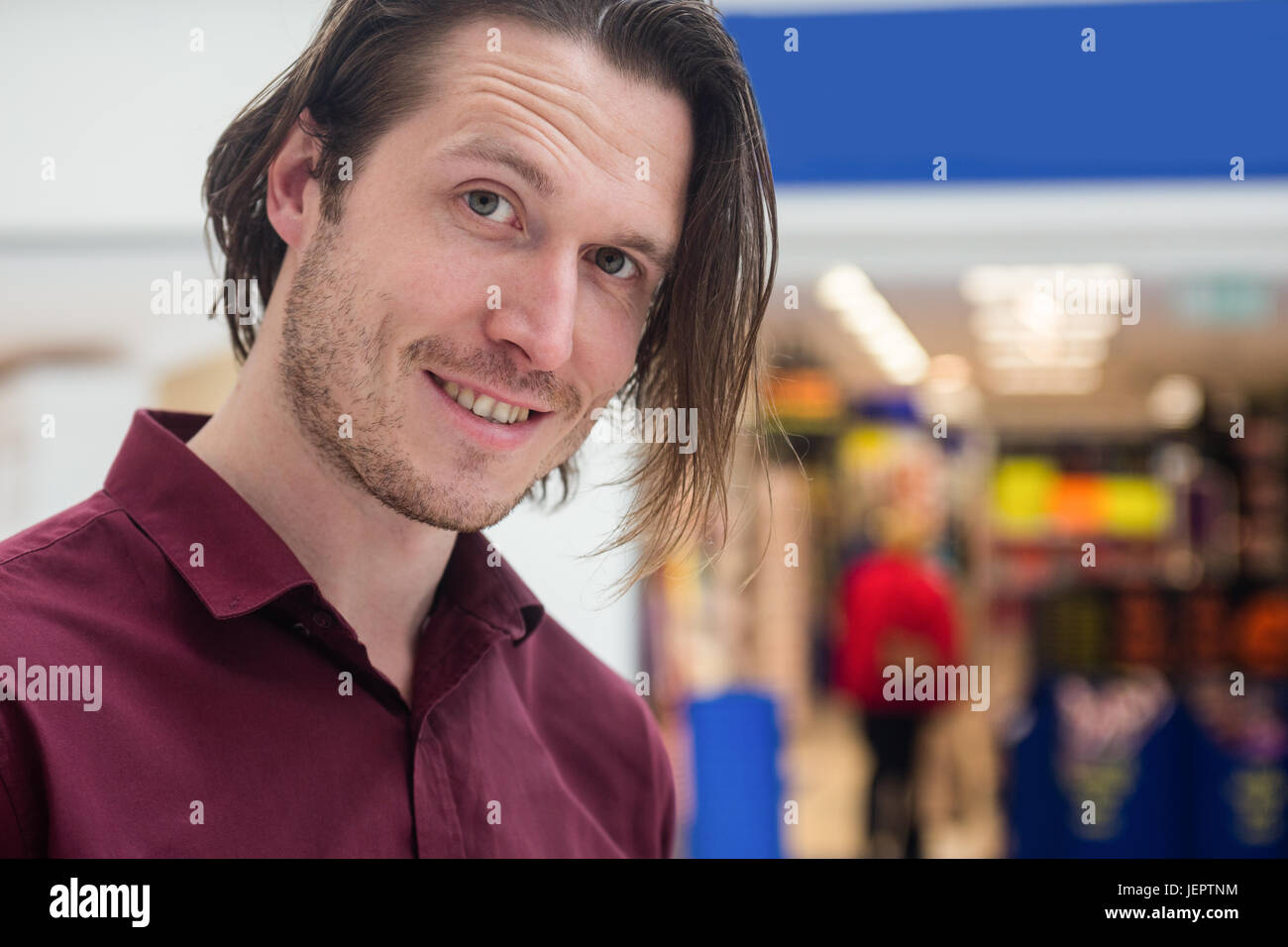 Portrait of man outside the shop Stock Photo - Alamy