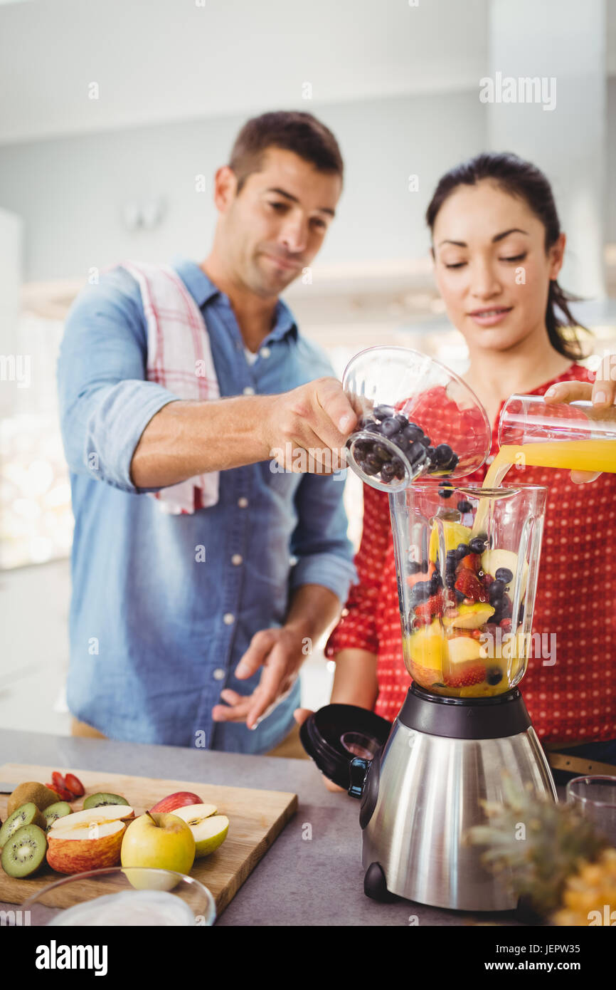 People preparing fruit juice Stock Photo - Alamy