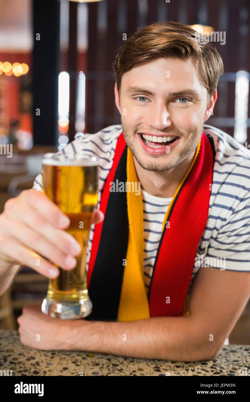 Man toasting a beer Stock Photo - Alamy