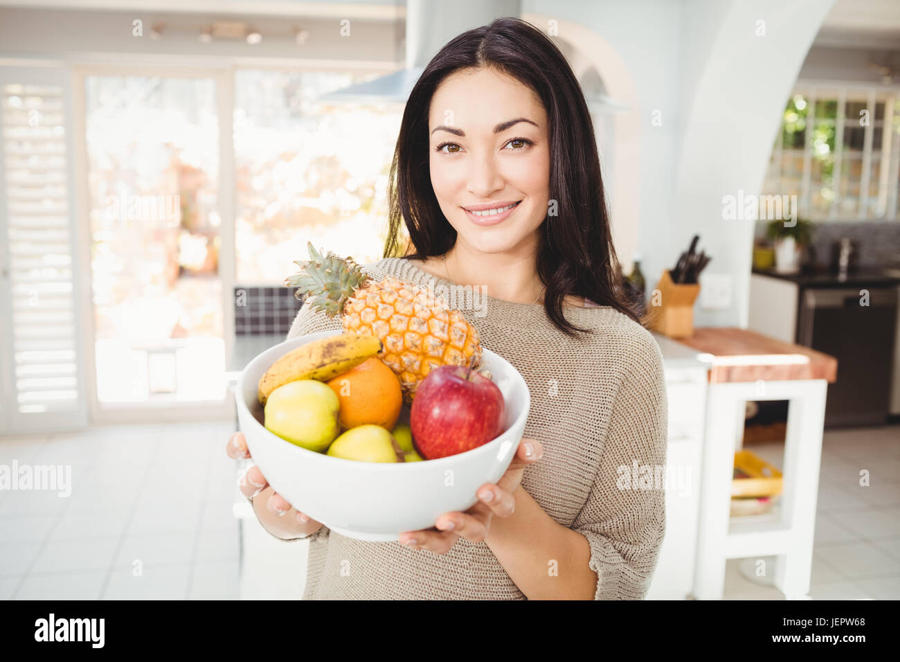Mid adult woman with fruits hi-res stock photography and images - Alamy