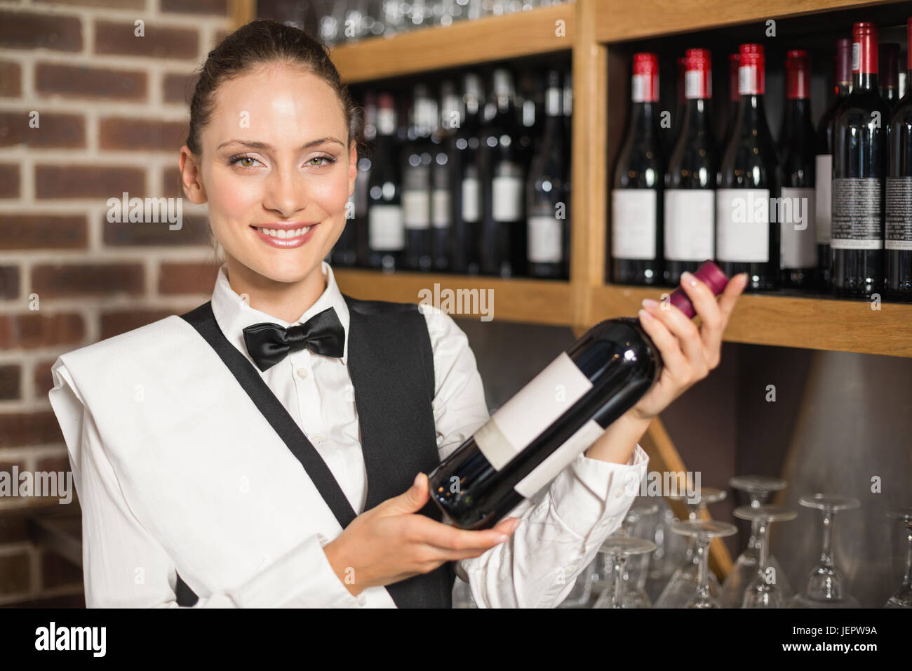 Barmaid bottle service hi-res stock photography and images - Alamy