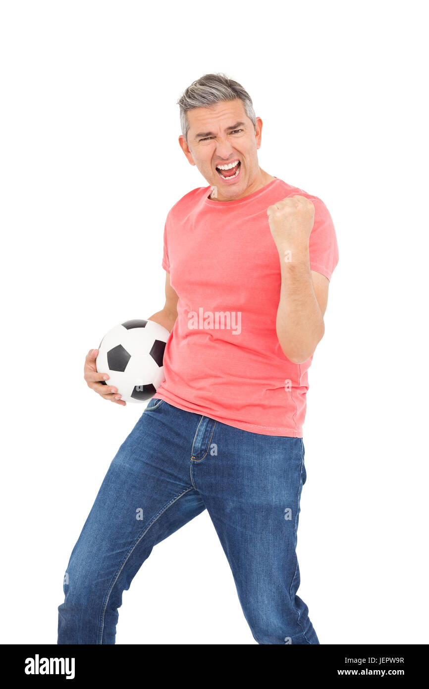 Mature man holding soccer Cut Out Stock Images & Pictures - Alamy