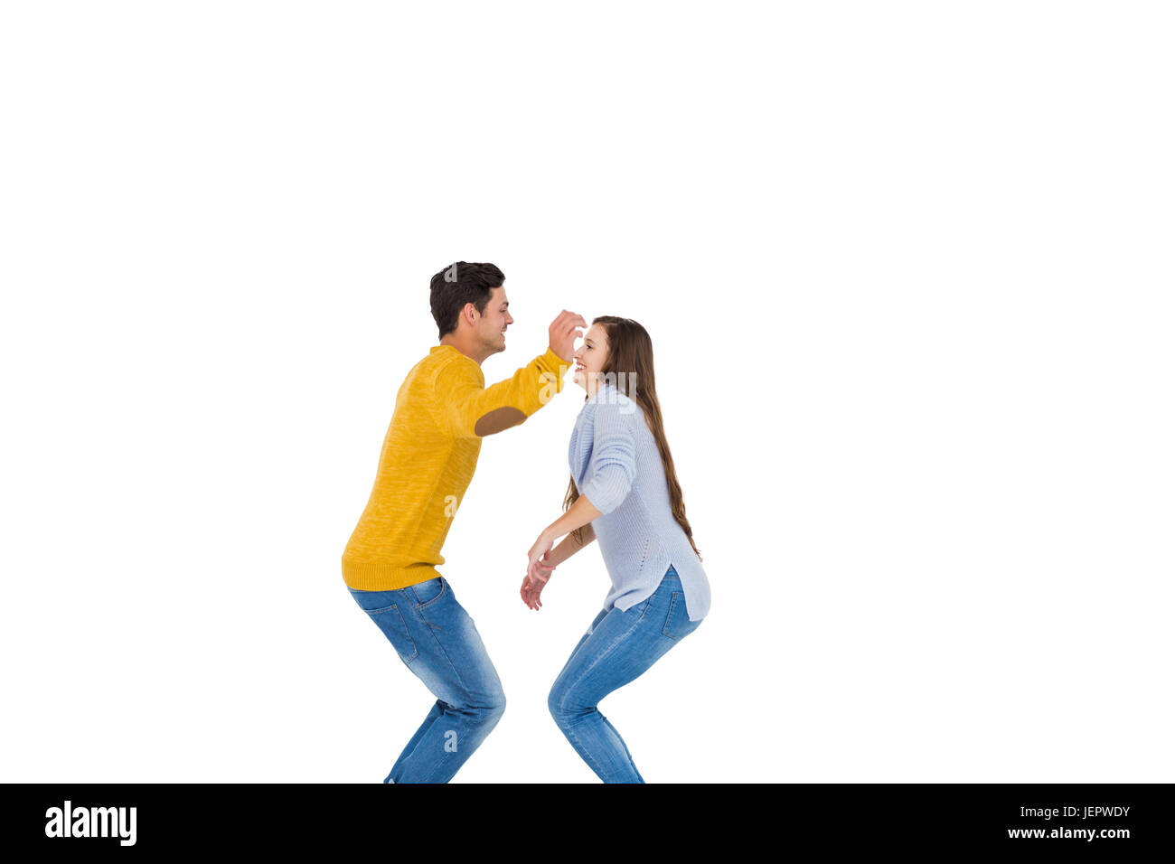 Happy couple dancing together Stock Photo - Alamy