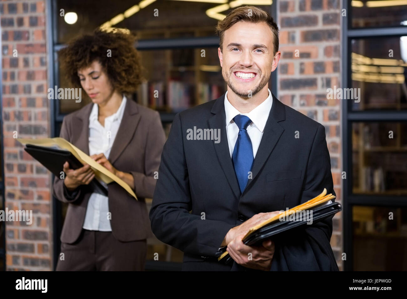 Lawyer looking at documents Stock Photo - Alamy