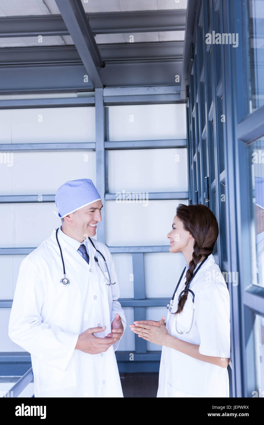 Doctors interacting with each other Stock Photo - Alamy