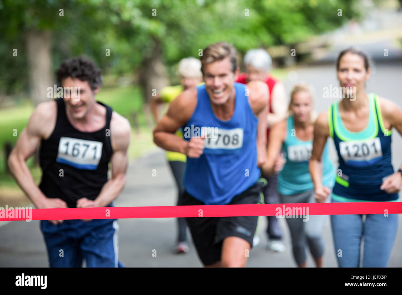 Marathon athletes close to the finish line Stock Photo - Alamy