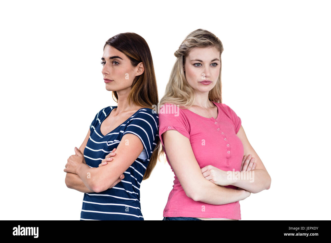 Upset friends with arms crossed Stock Photo - Alamy
