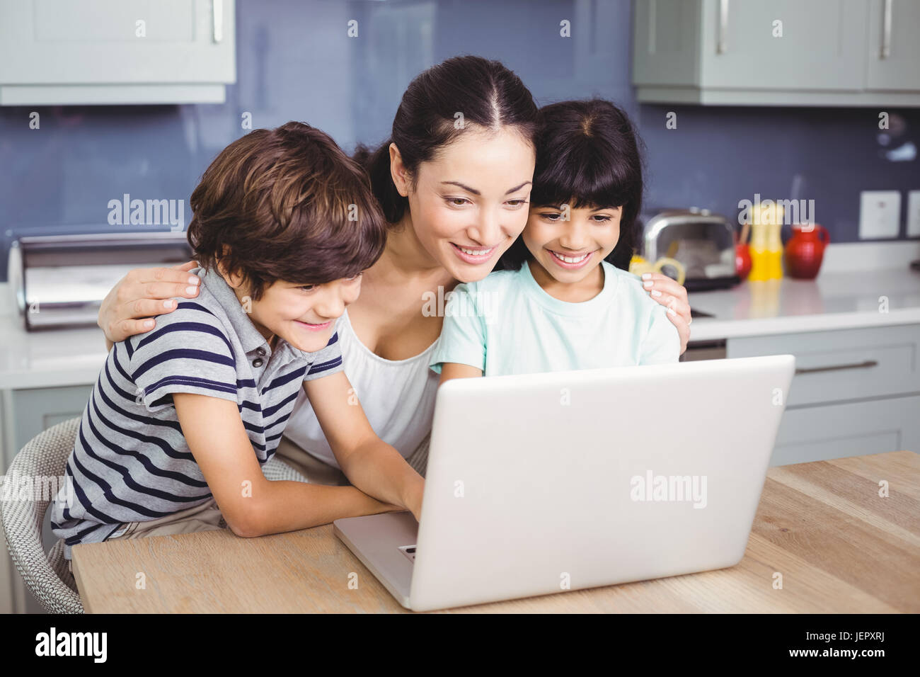 Children working together on computer hi-res stock photography and ...