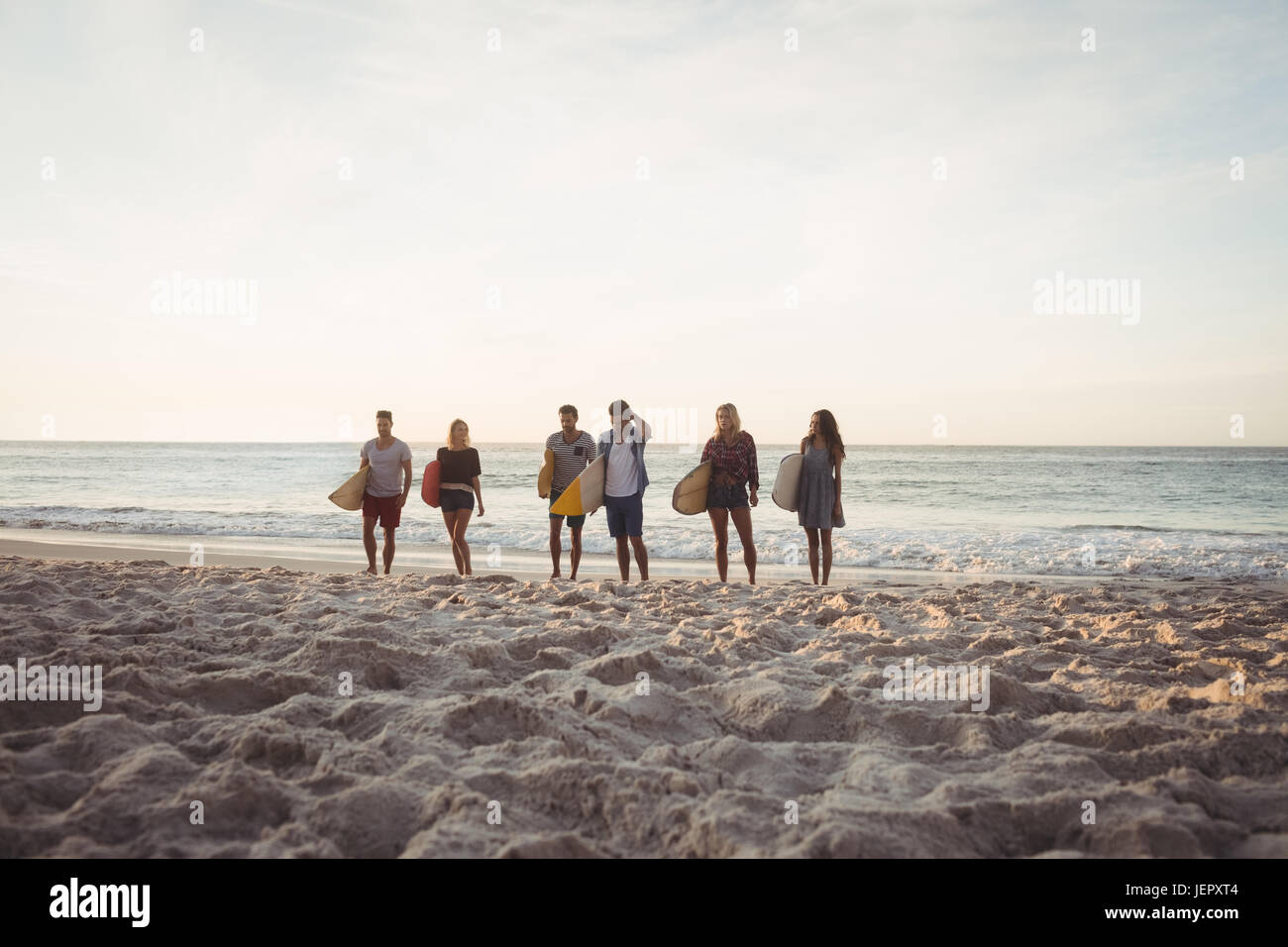 Happy man friends surfer hi-res stock photography and images - Alamy