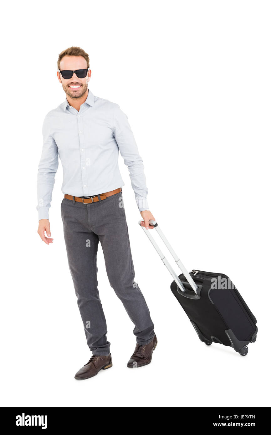 Young man with trolley bag Stock Photo - Alamy