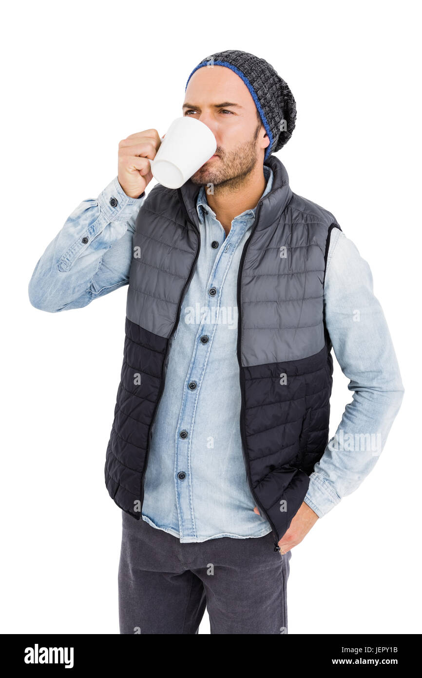 Happy young man having coffee Stock Photo - Alamy