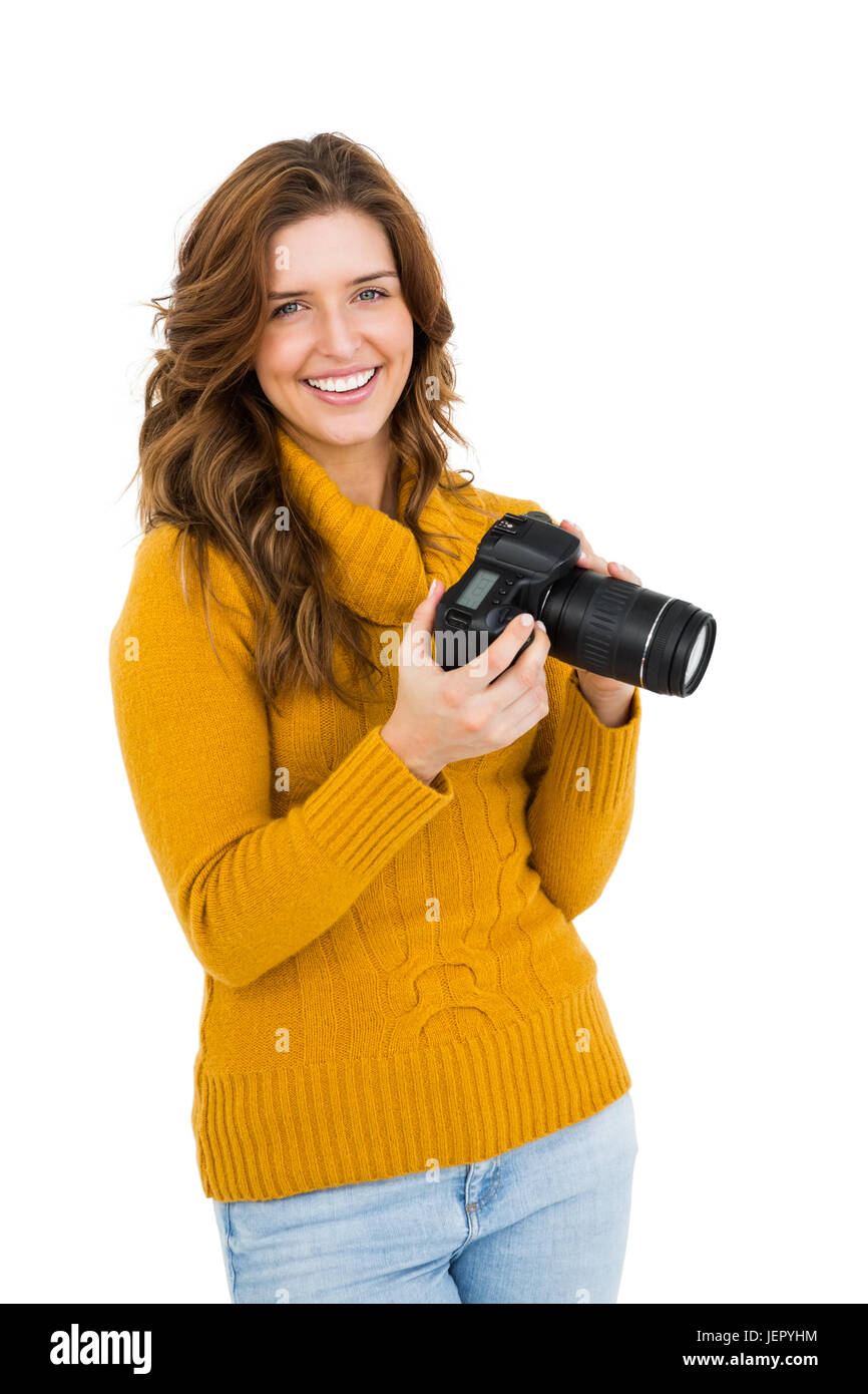 Happy young woman using camera Stock Photo - Alamy