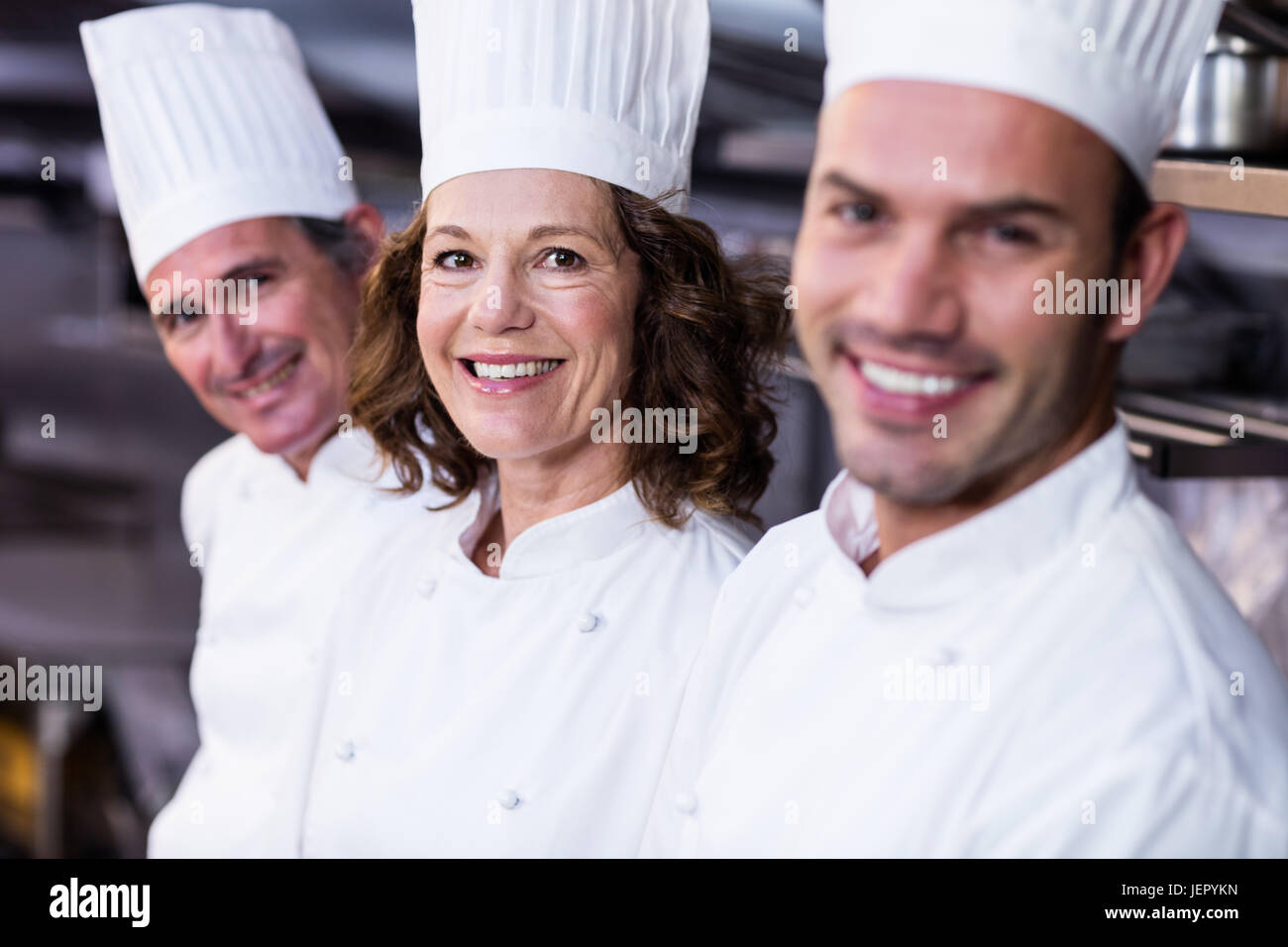 Chefs smiling hi-res stock photography and images - Alamy