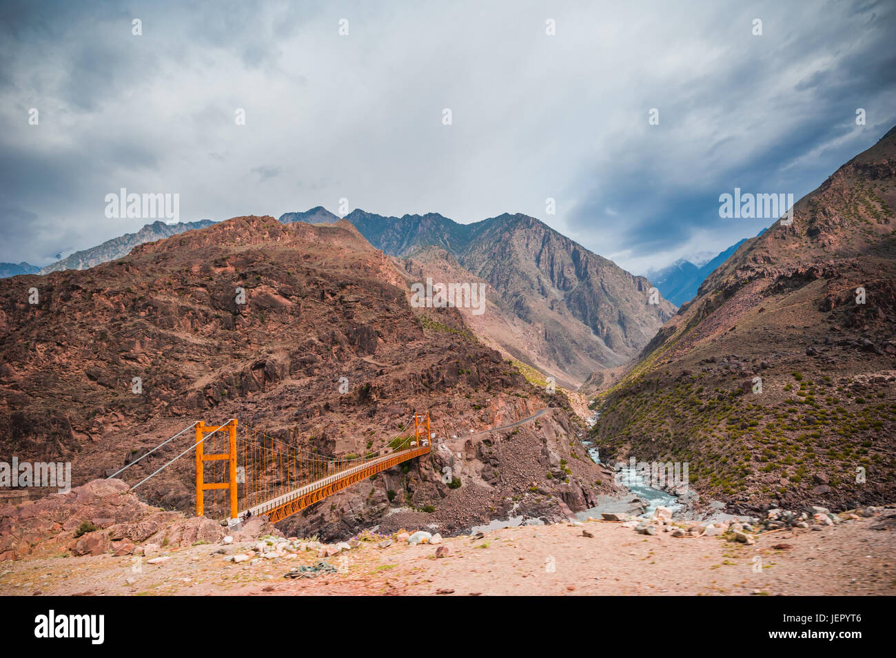 Suspension bridge across the Indus River along the Karakorum Highway in ...