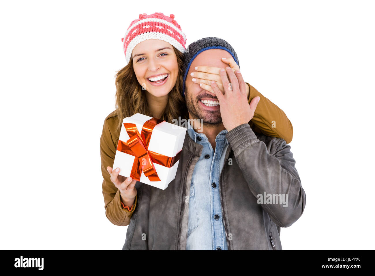 Woman giving a surprise gift to her man Stock Photo - Alamy