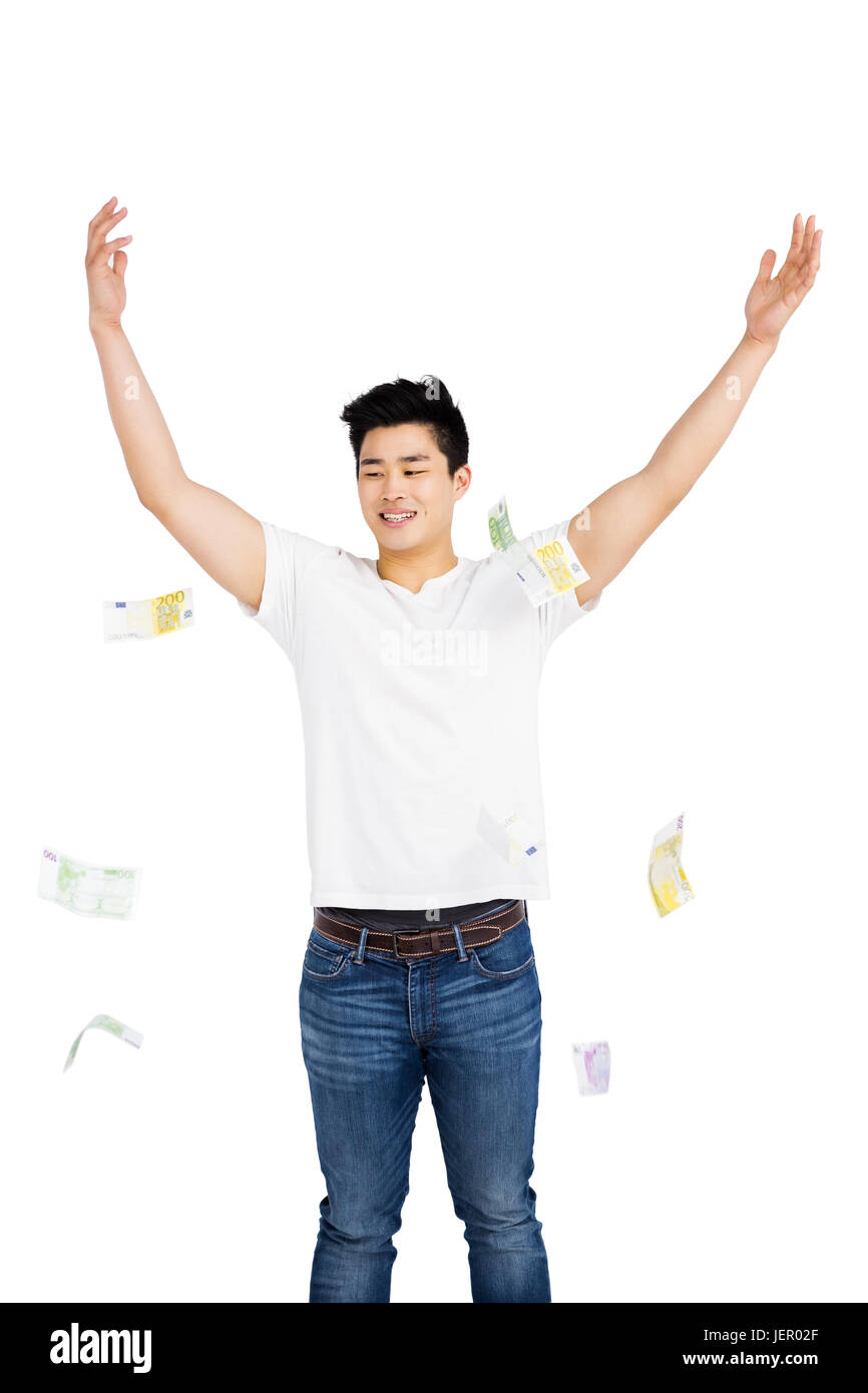 Handsome young man throwing money hi-res stock photography and images ...