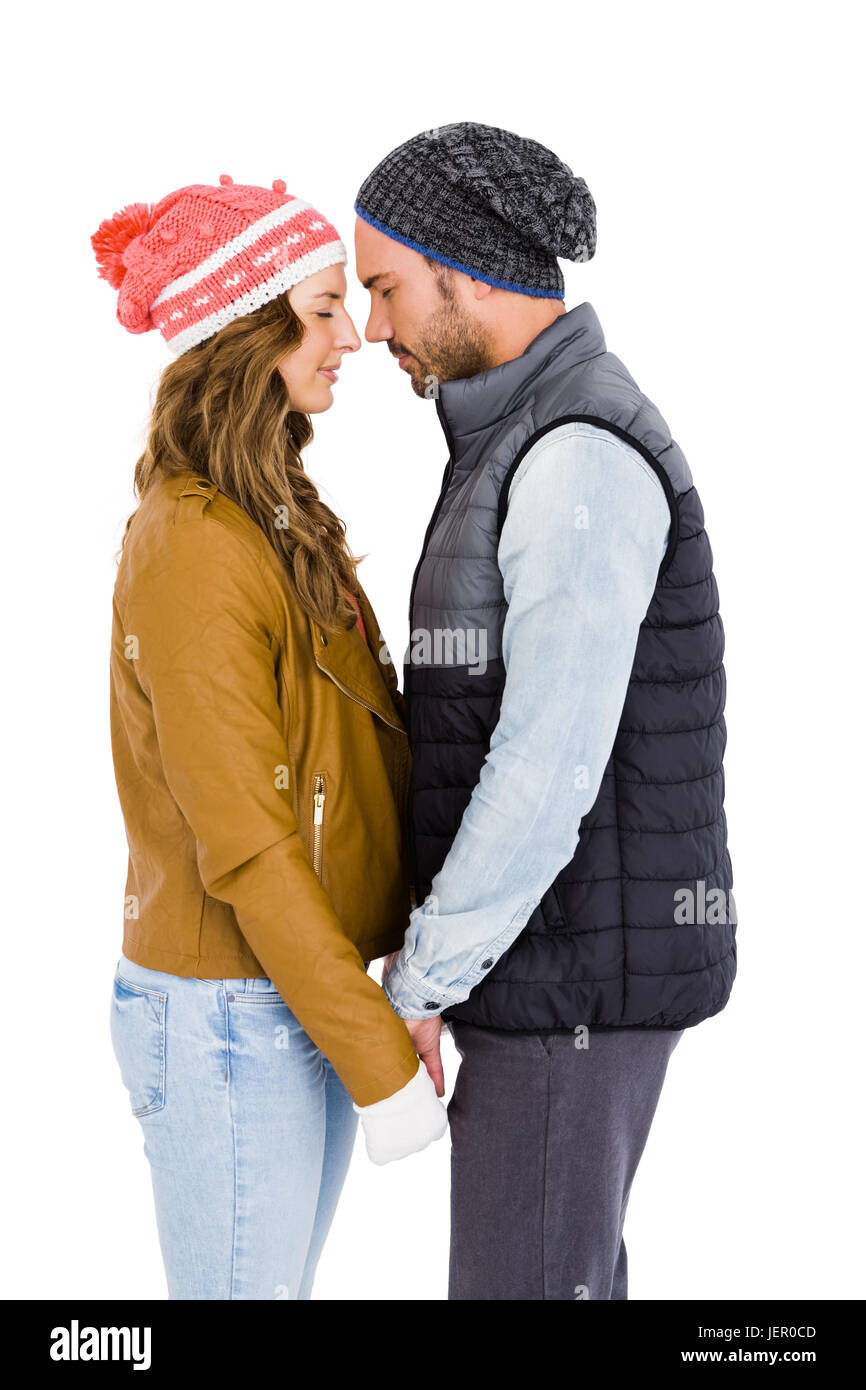 Standing smiling face to face holding Cut Out Stock Images & Pictures ...