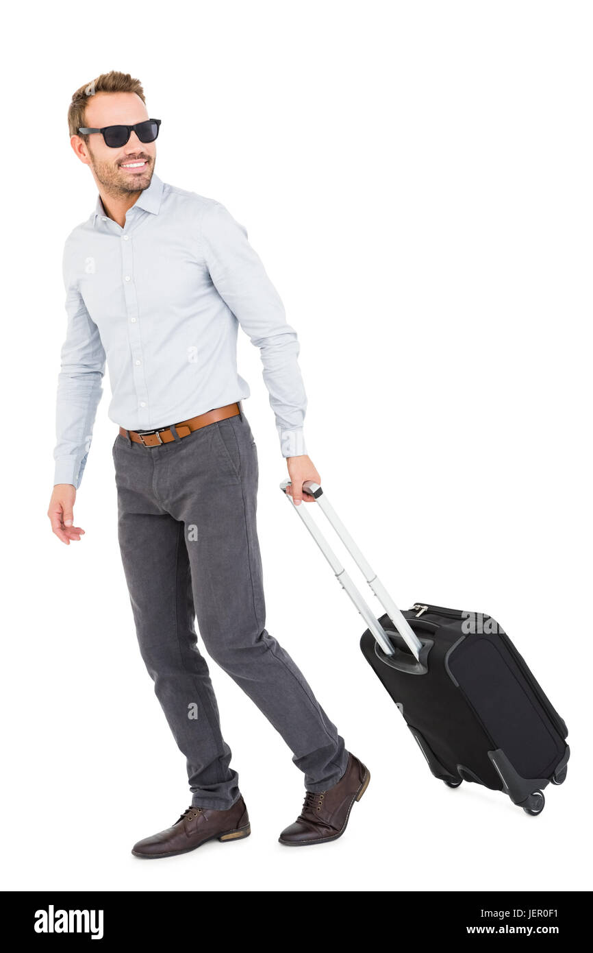 Tourist young man holding Cut Out Stock Images & Pictures - Alamy