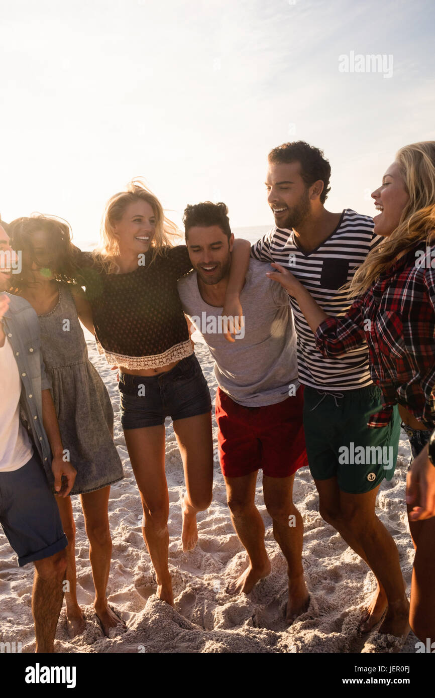 Happy friends dancing together Stock Photo - Alamy