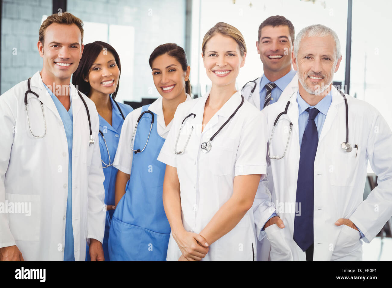 Medical team smiling in hospital Stock Photo - Alamy
