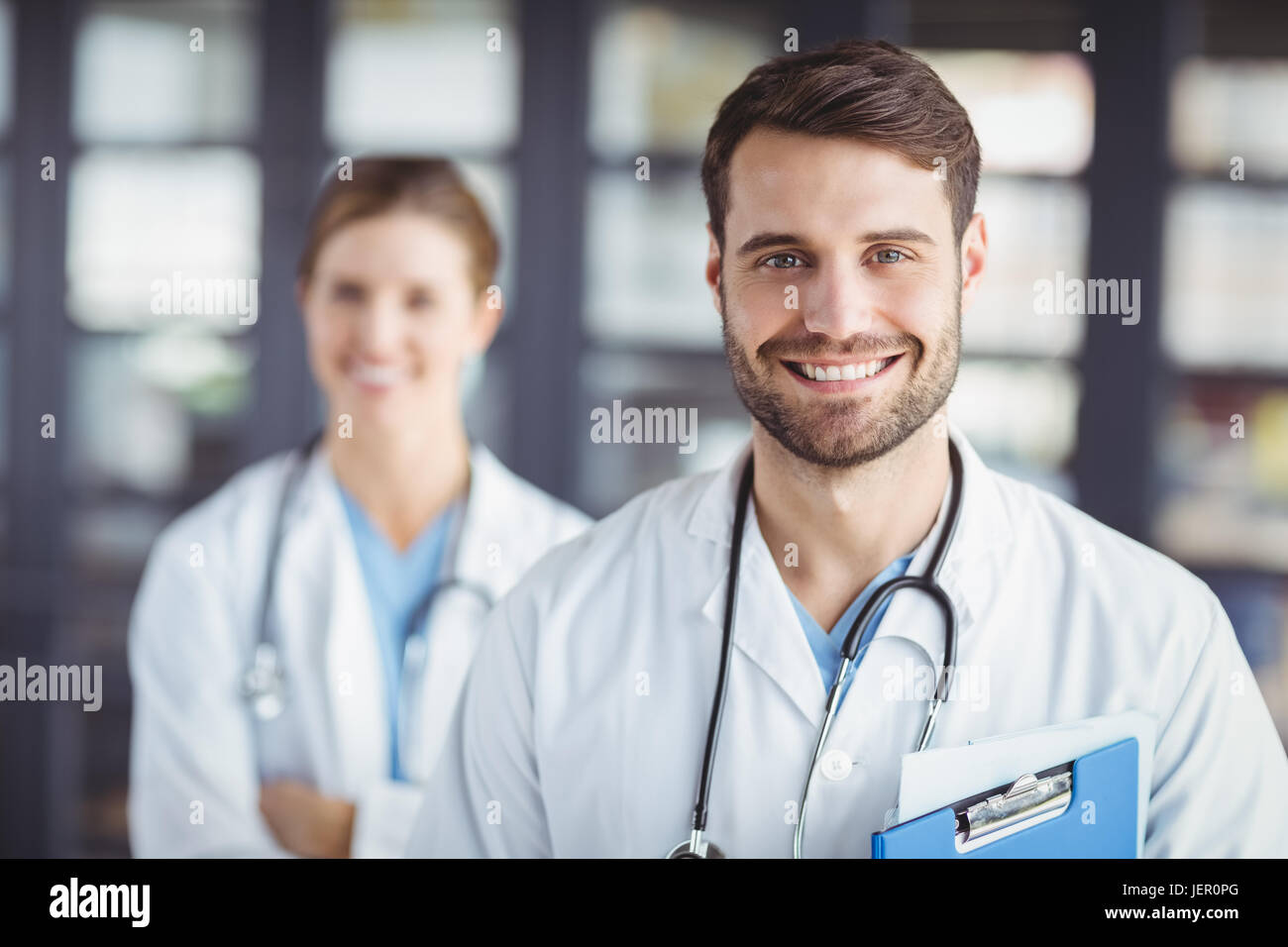 Portrait of happy doctors Stock Photo - Alamy