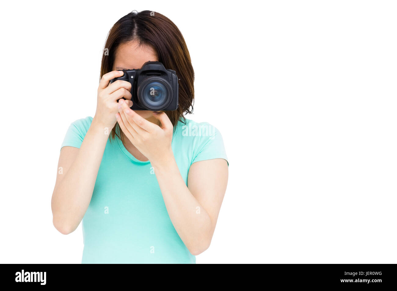 Woman photographing with camera Stock Photo - Alamy