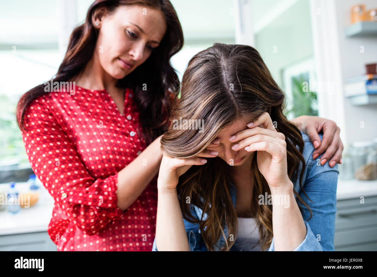 Tensed young woman hi-res stock photography and images - Alamy
