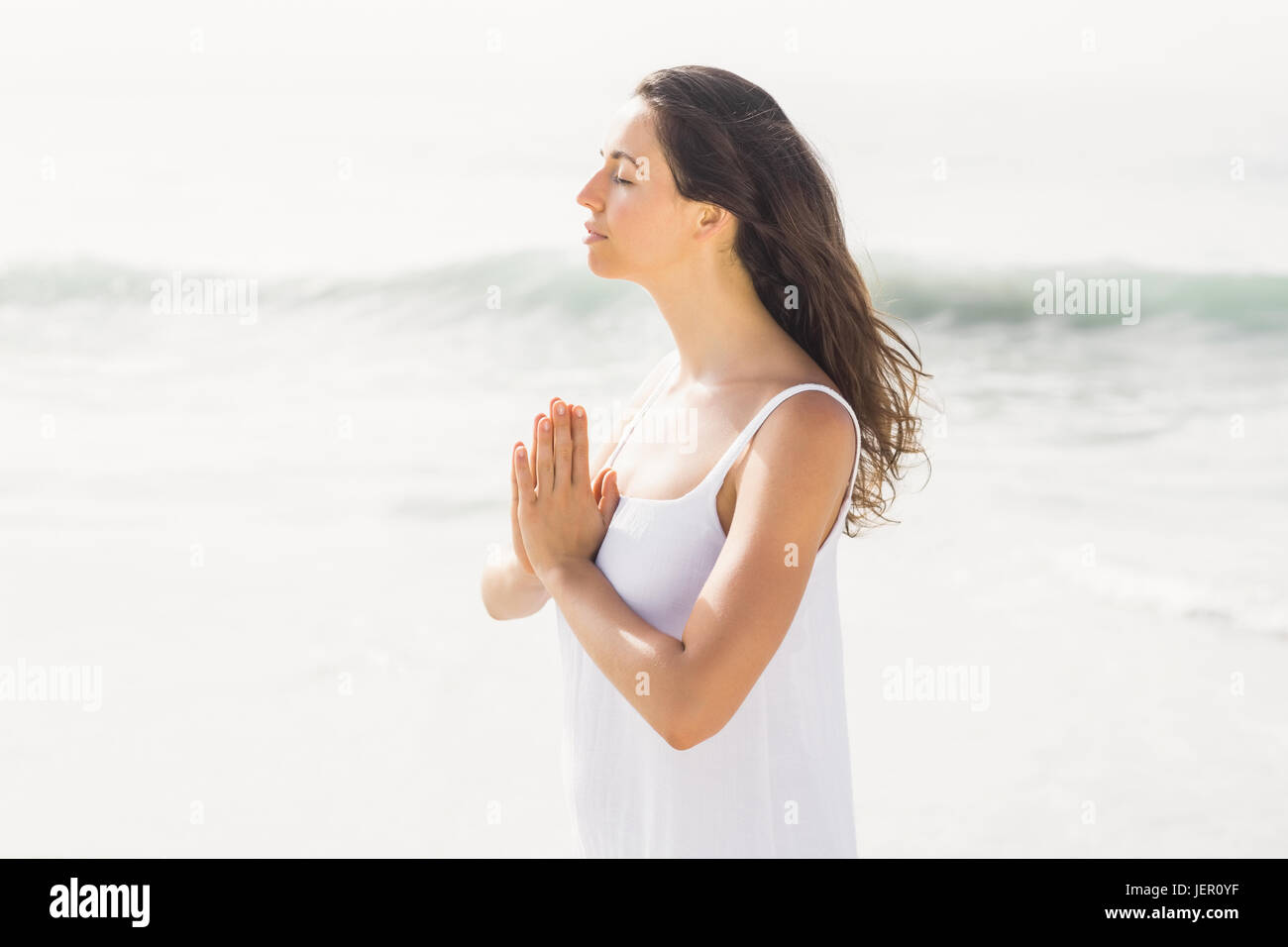 Beautiful woman in lotus position Stock Photo - Alamy