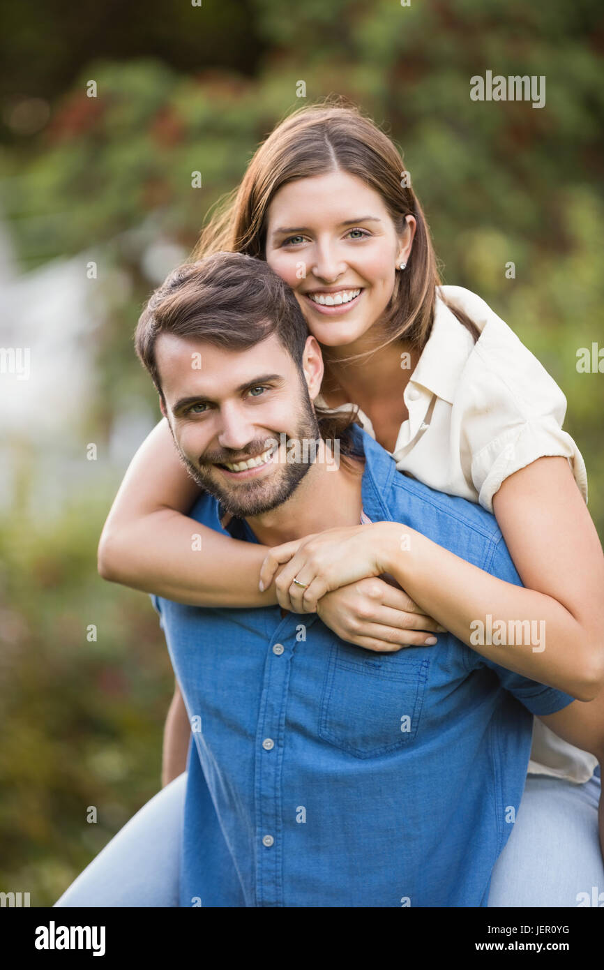 Portrait of man carrying woman Stock Photo - Alamy