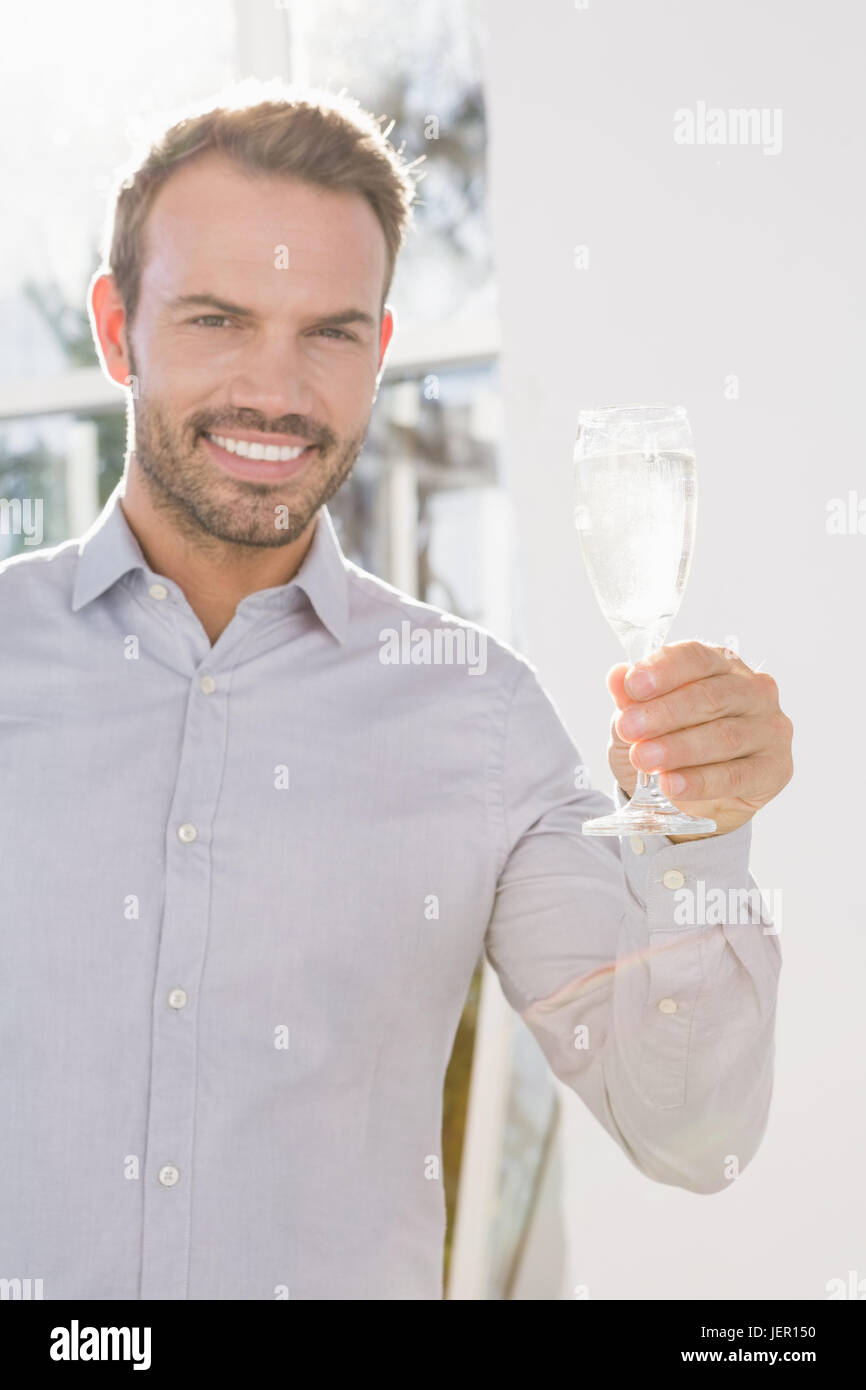 Happy elegant man holding glass hi-res stock photography and images - Alamy